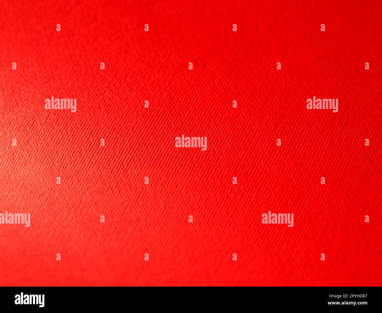 Abstract red background with texture. Close-up of paper surface with ...