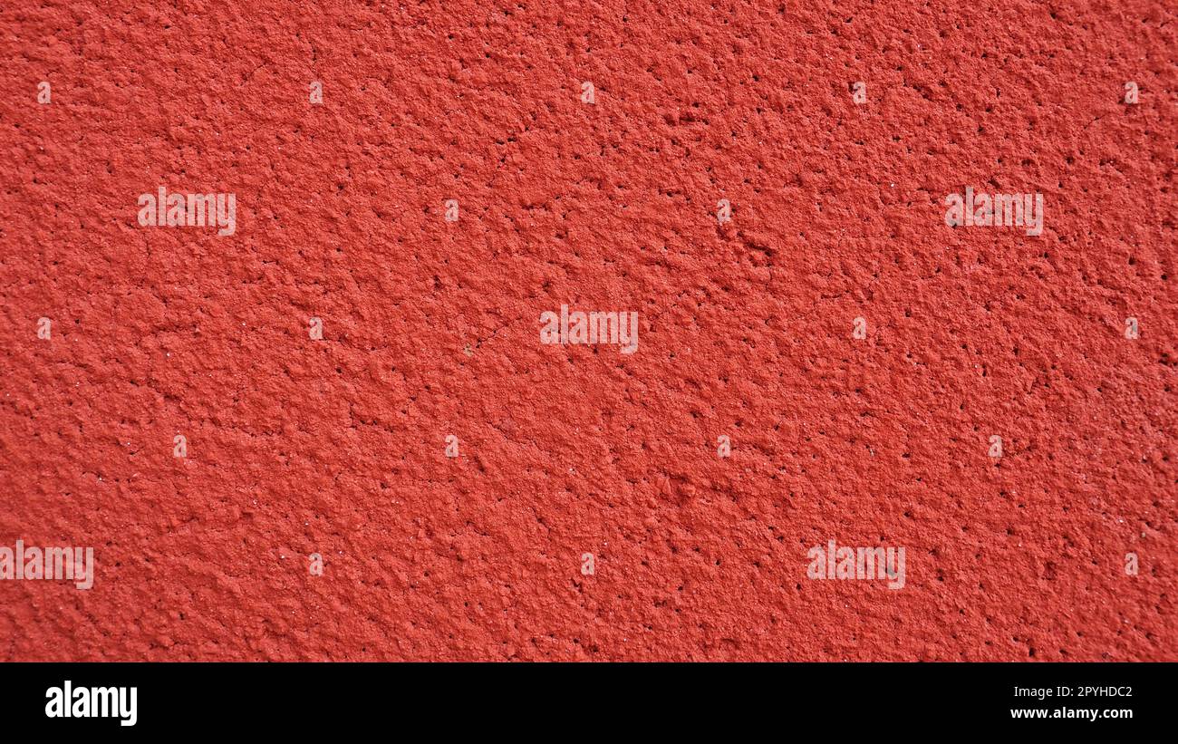 Background, texture of cement plaster of red color. Plastering of ...