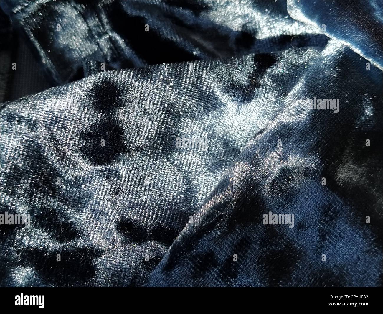 Velvet velor cloth background with glowing light and dark shadows ...