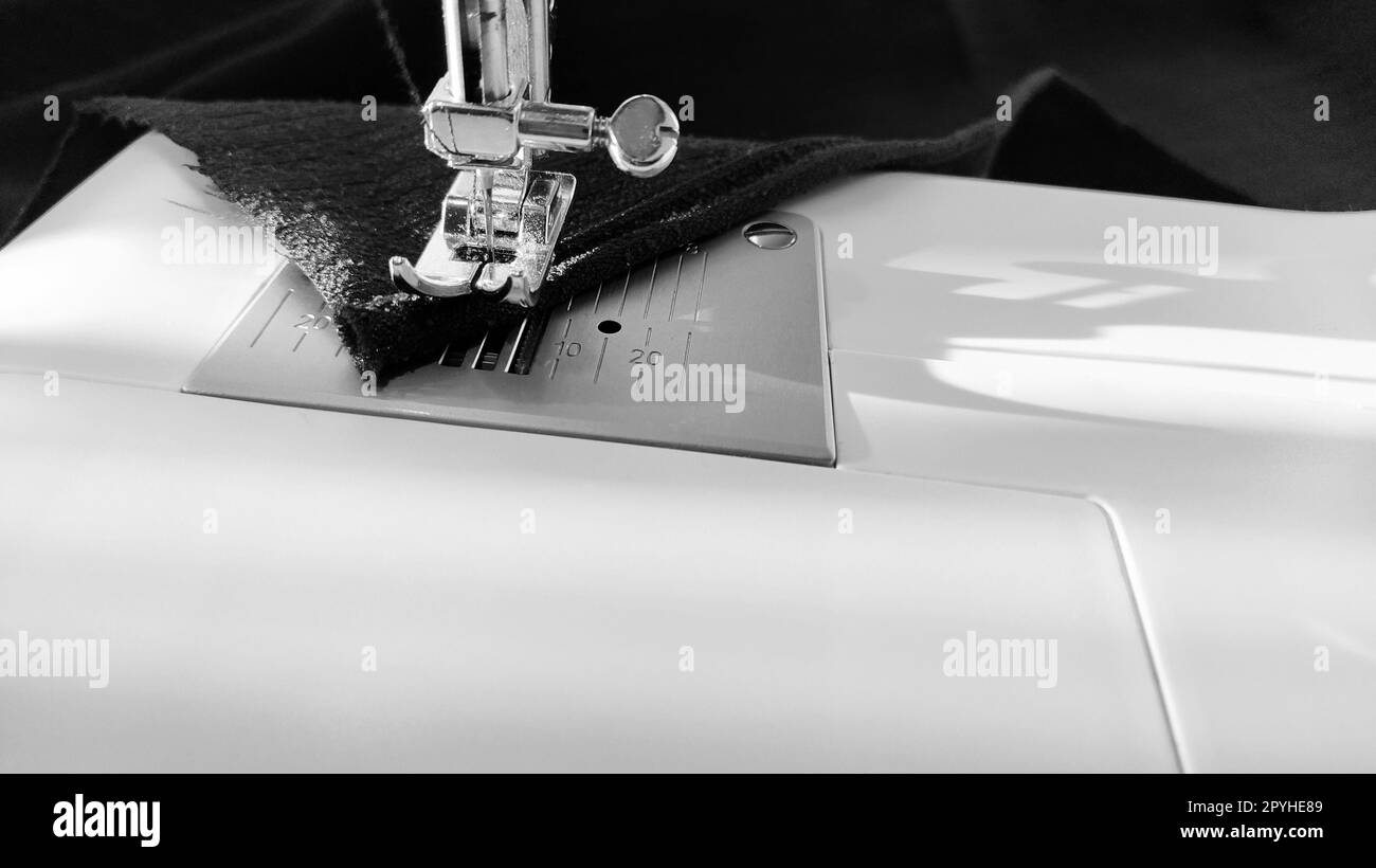 Sewing process on a modern sewing machine, close-up. Sewing machine ...