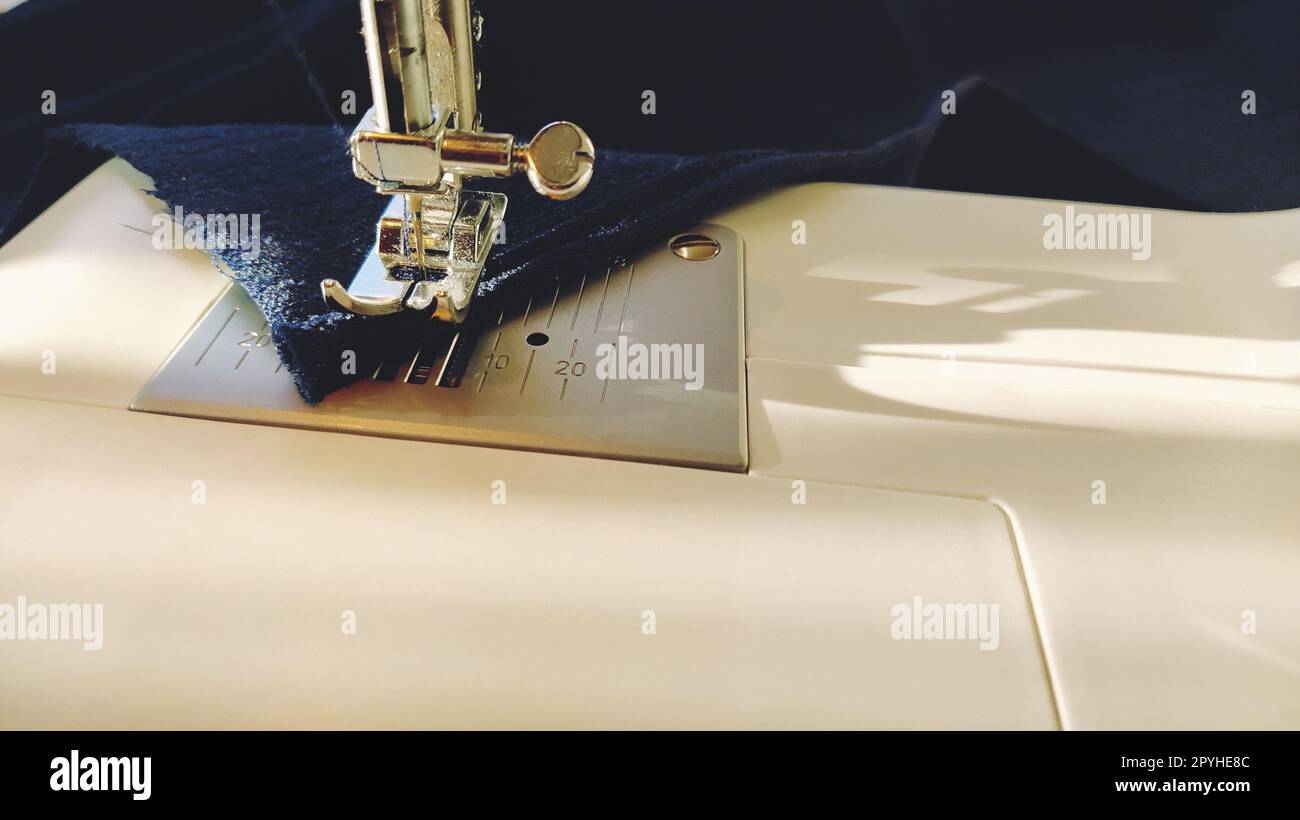 Sewing process on a modern sewing machine, close-up. Sewing machine ...