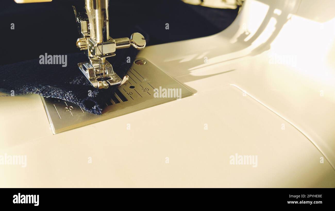 Sewing process on a modern sewing machine, close-up. Sewing machine ...