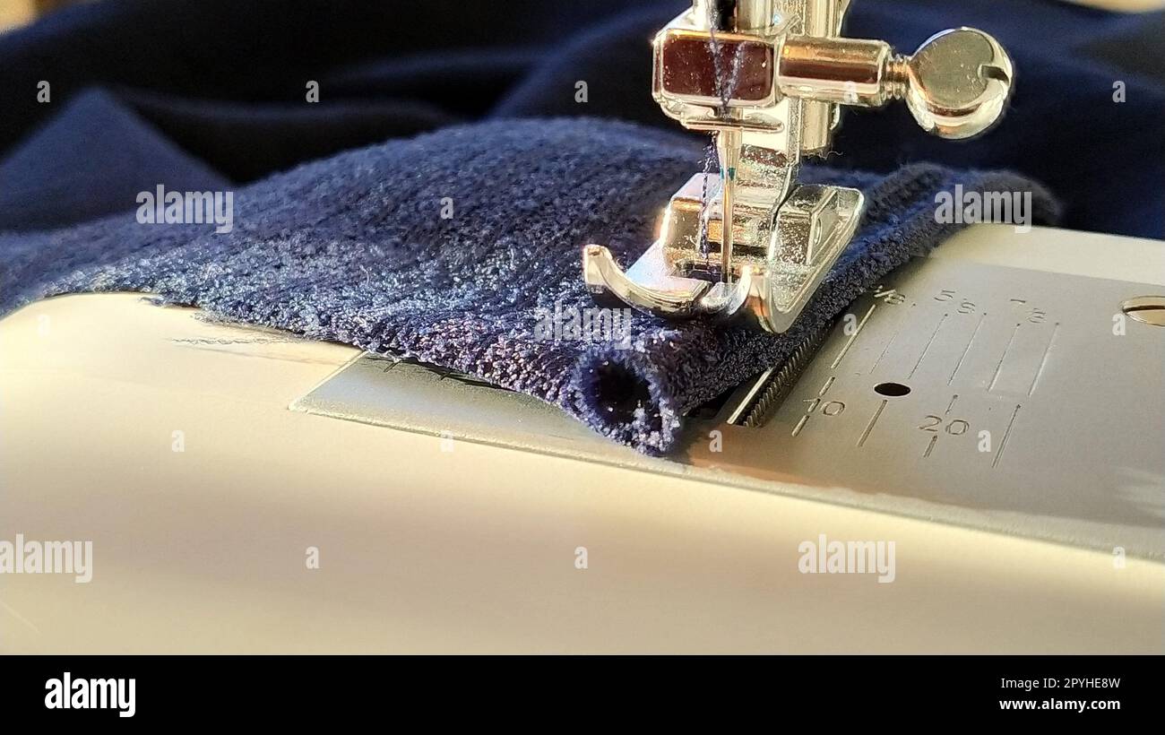 Sewing process on a modern sewing machine, close-up. Sewing machine ...