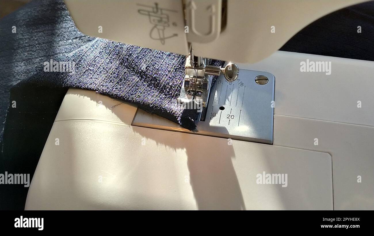 Sewing process on a modern sewing machine, close-up. Sewing machine ...