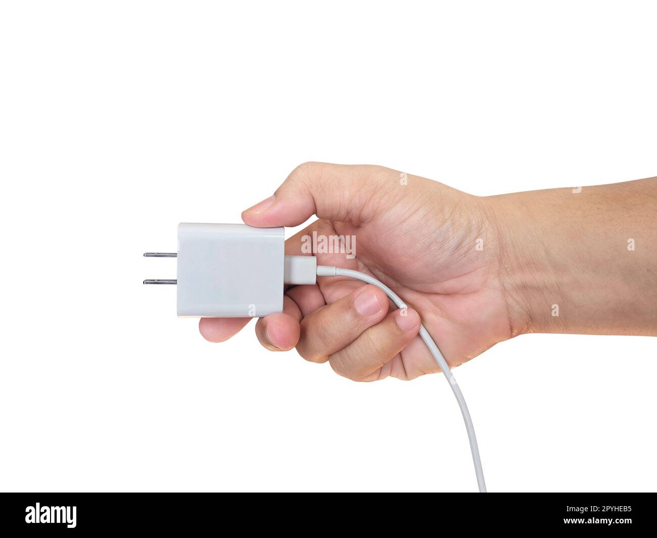 Hand holding a power plug smartphone white background Stock Photo - Alamy