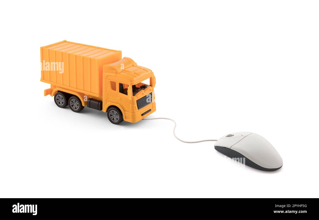 Yellow cargo delivery truck miniature connected to computer mouse on ...