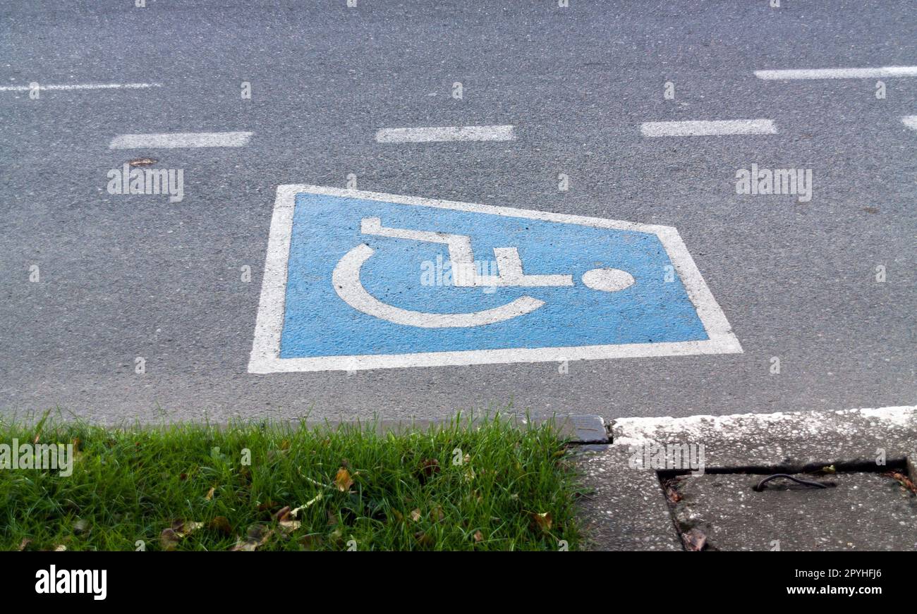 Disabled car parking bay painted hi-res stock photography and images ...
