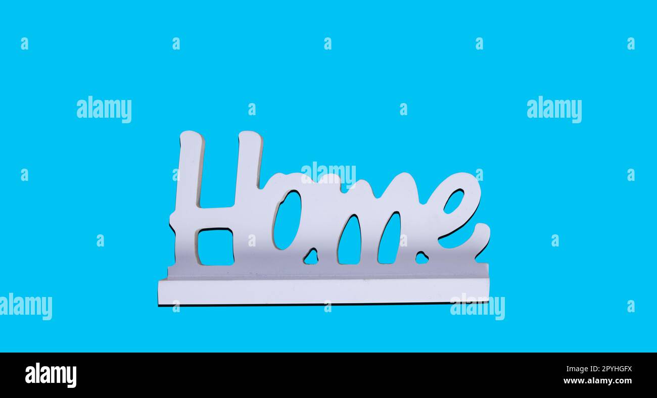 Sign of home on the blue Stock Photo - Alamy