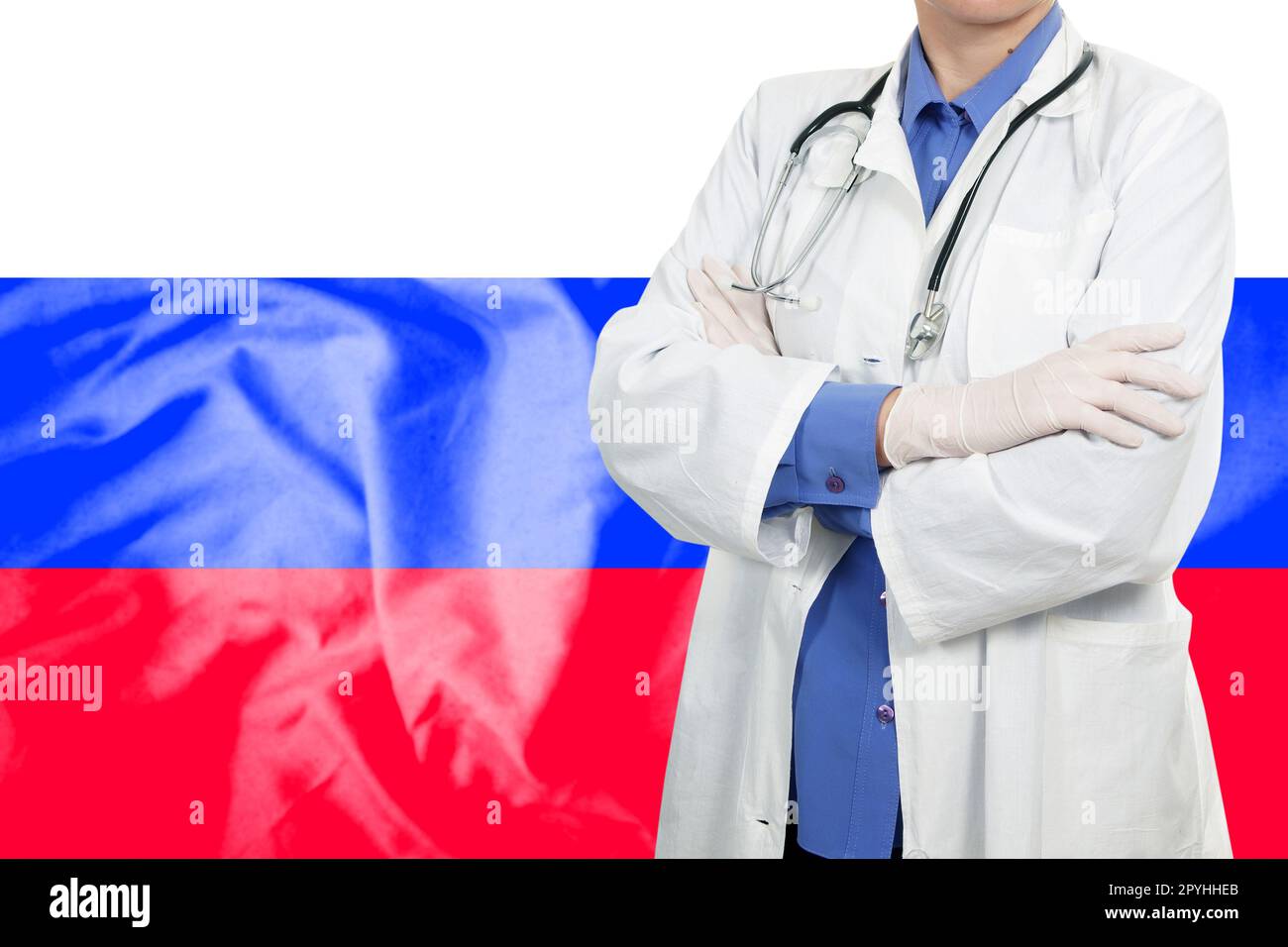 Doctor standing with the flag Stock Photo - Alamy