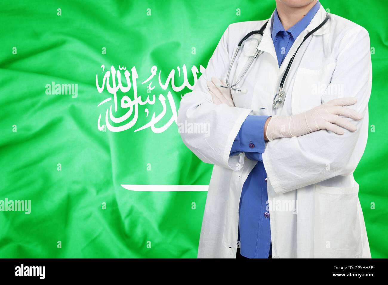 Doctor standing with the flag Stock Photo - Alamy