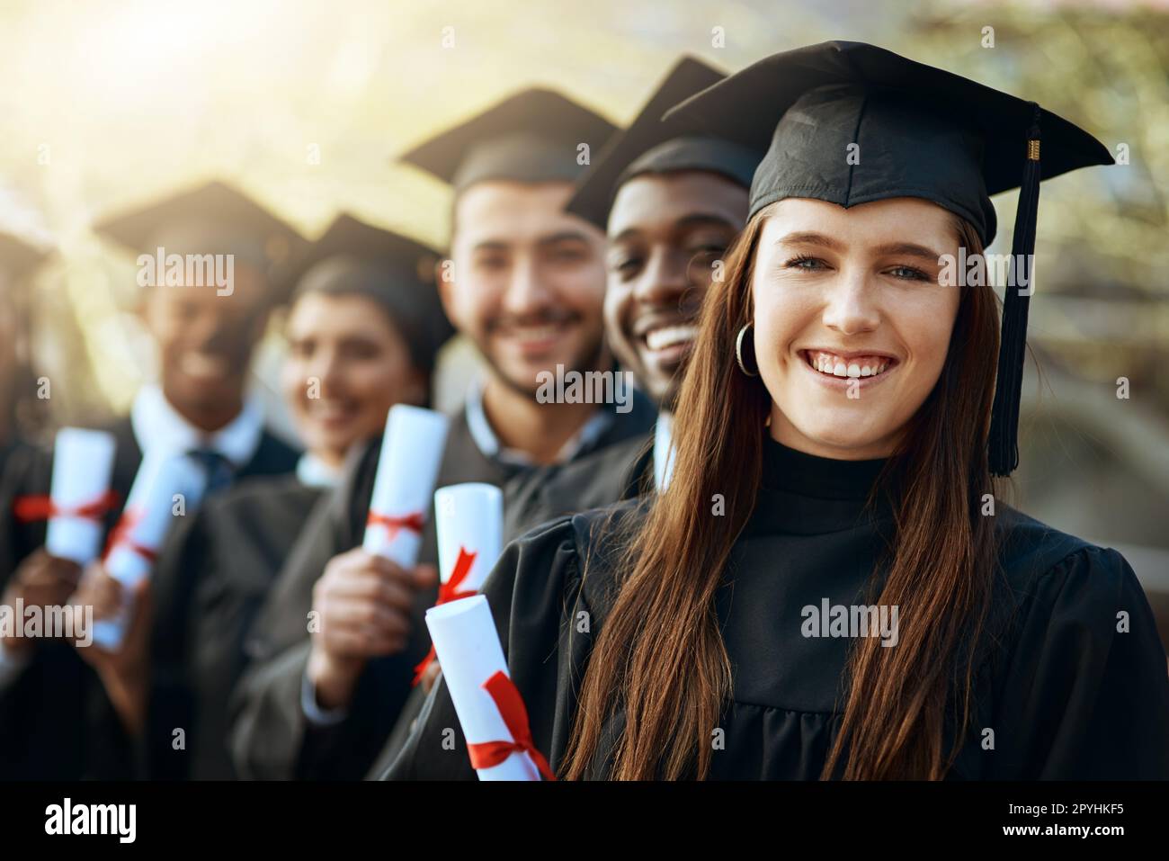 All set for the next chapter in life. Portrait of a group of young ...