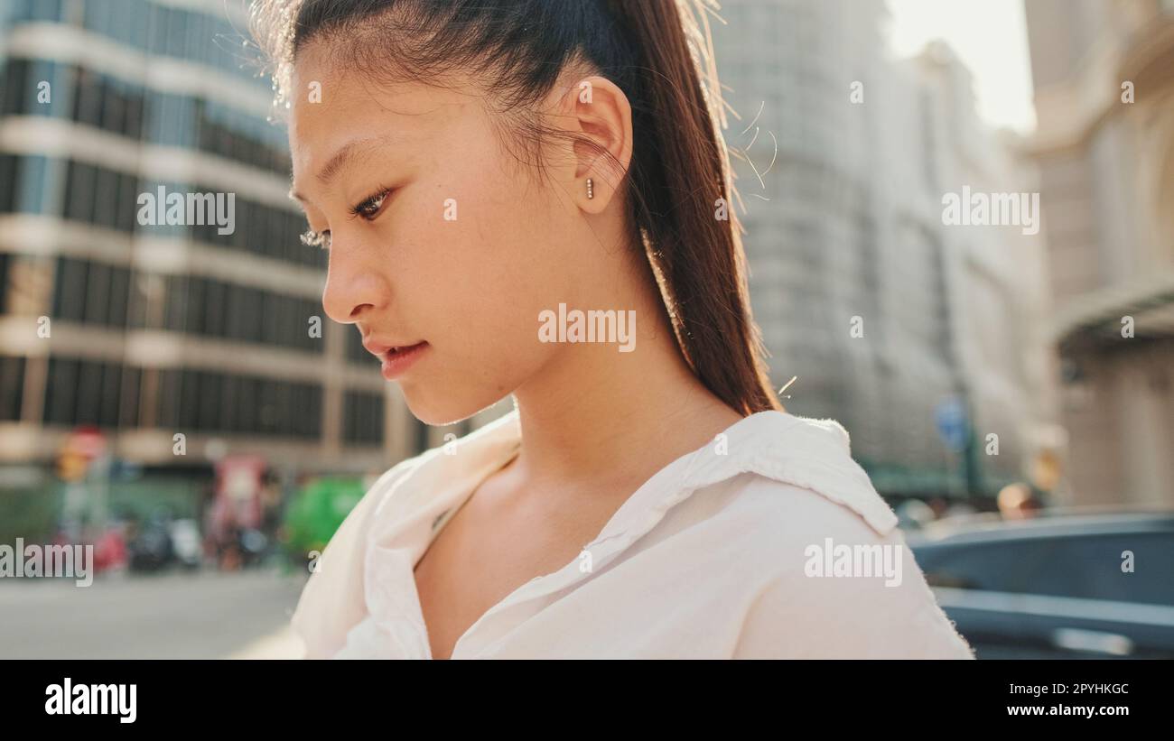 Woman looks around road hi-res stock photography and images - Alamy