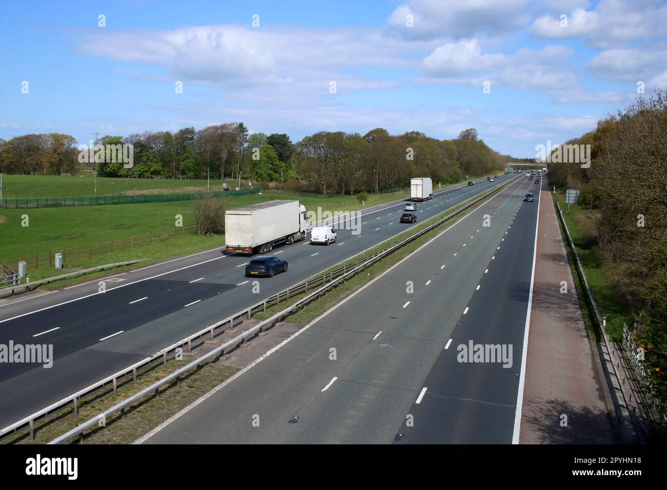 Light traffic on three lane carriageways of M6 motorway in Lancashire ...