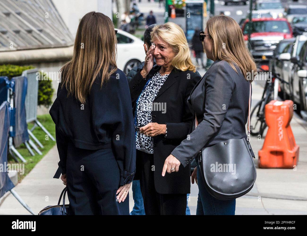 Cande Carroll, right, arrives at federal court to testify in her sister ...