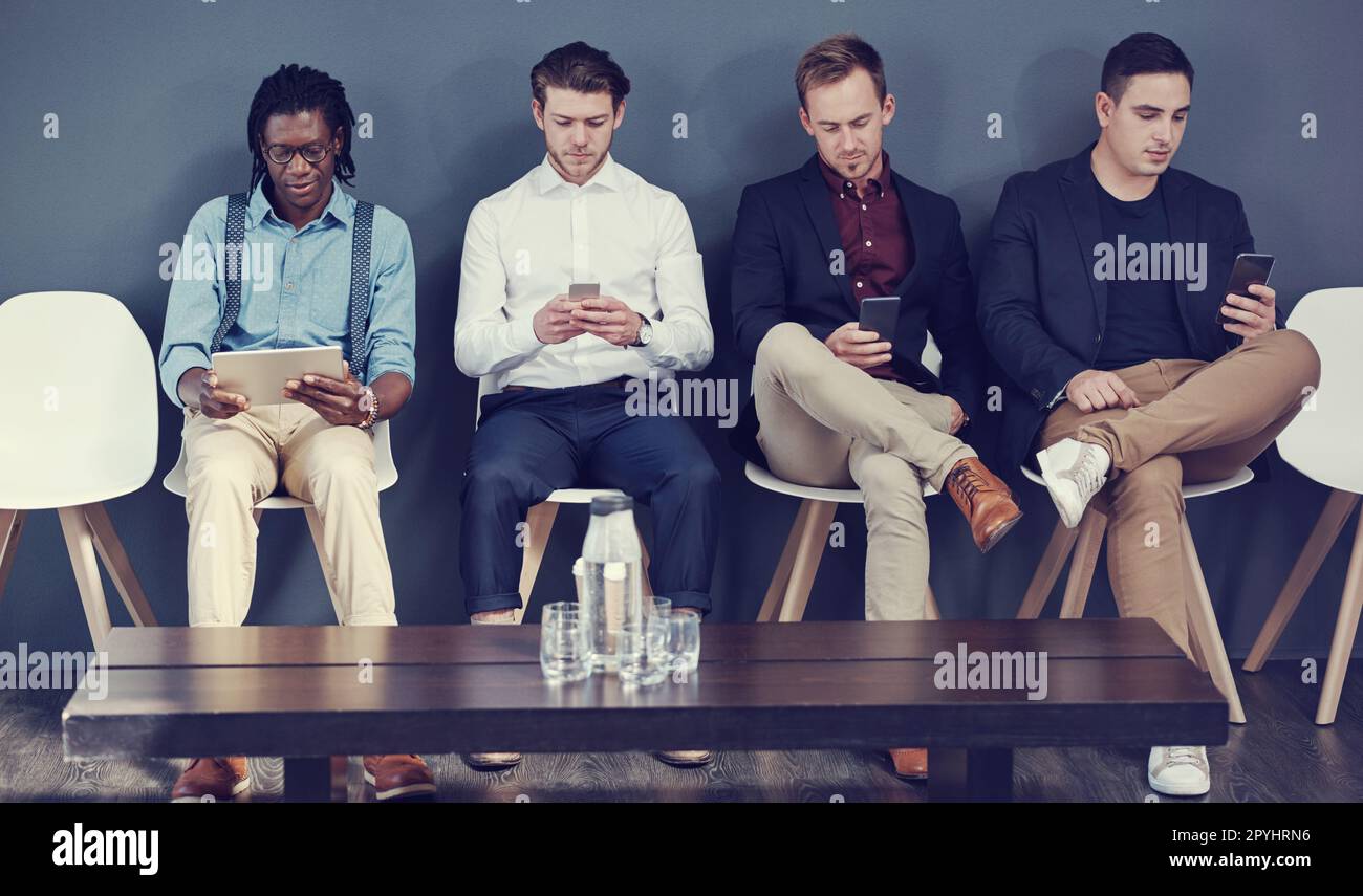 The waiting room is a great place to do some work. a group of ...