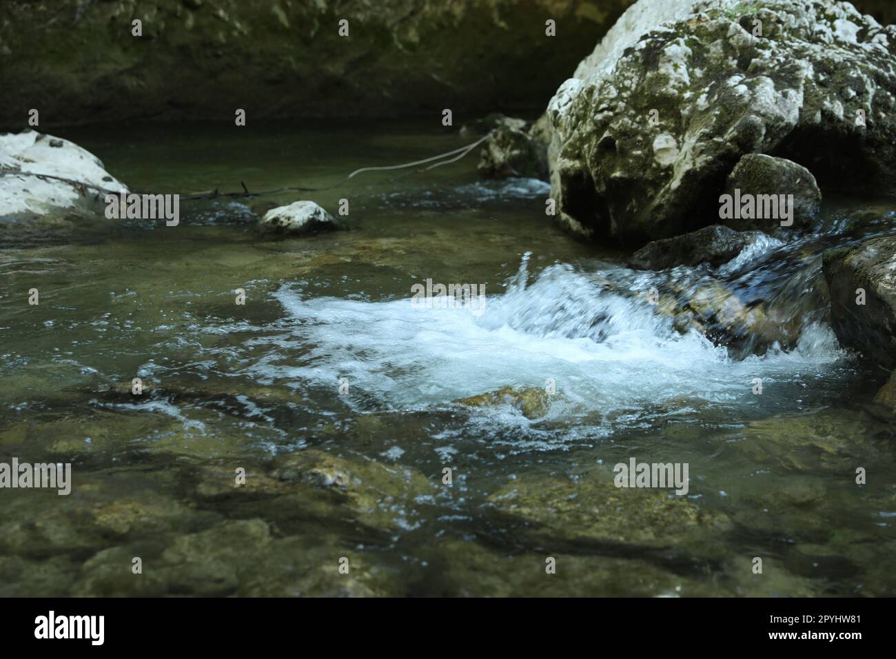 Picturesque landscape with stones and dripping stream Stock Photo - Alamy