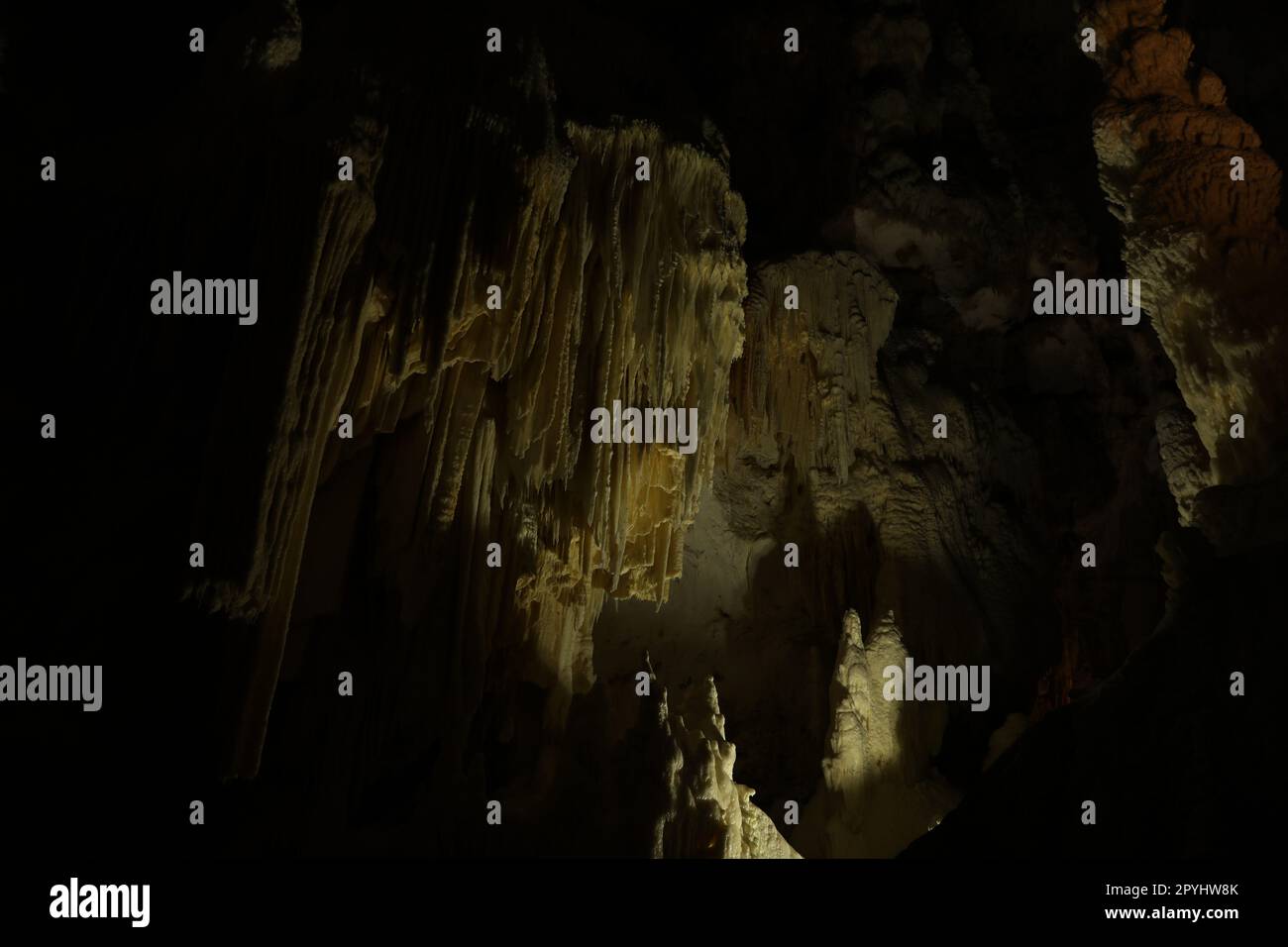 Many stalactite and stalagmite formations inside cave Stock Photo - Alamy