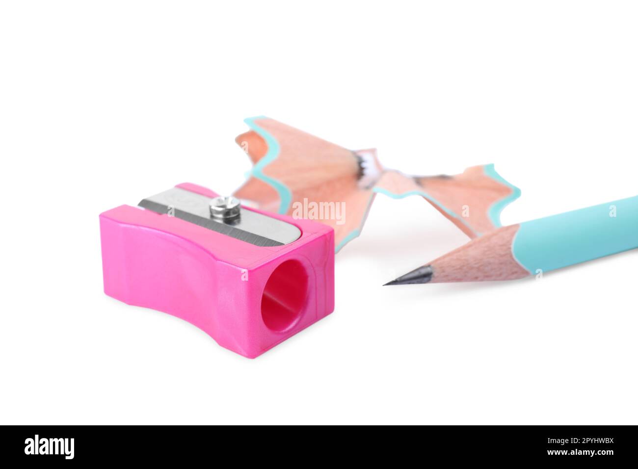 Pink sharpener with shavings and pencil on white background Stock Photo ...