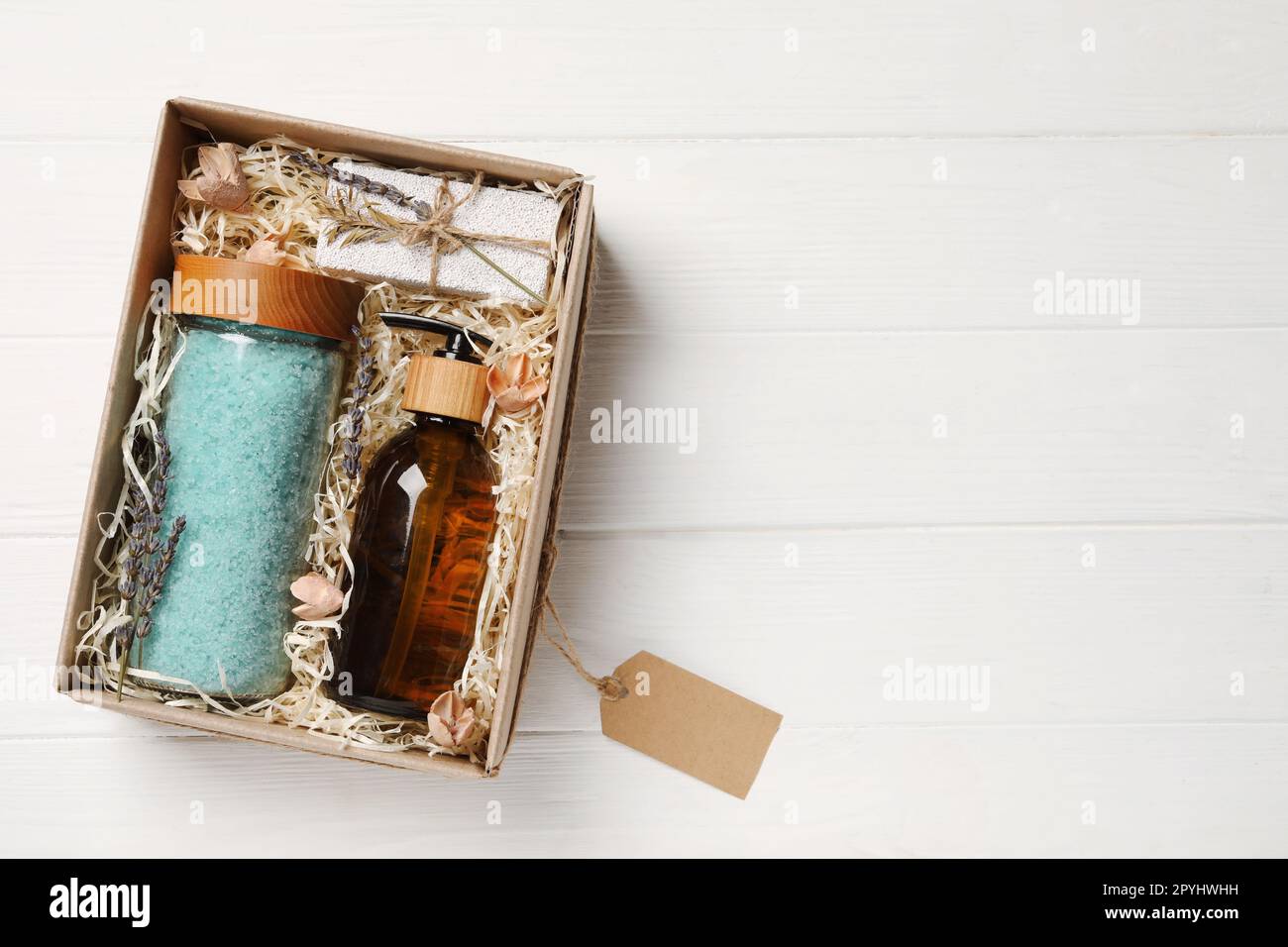 Spa gift set on white wooden table, top view. Space for text Stock ...