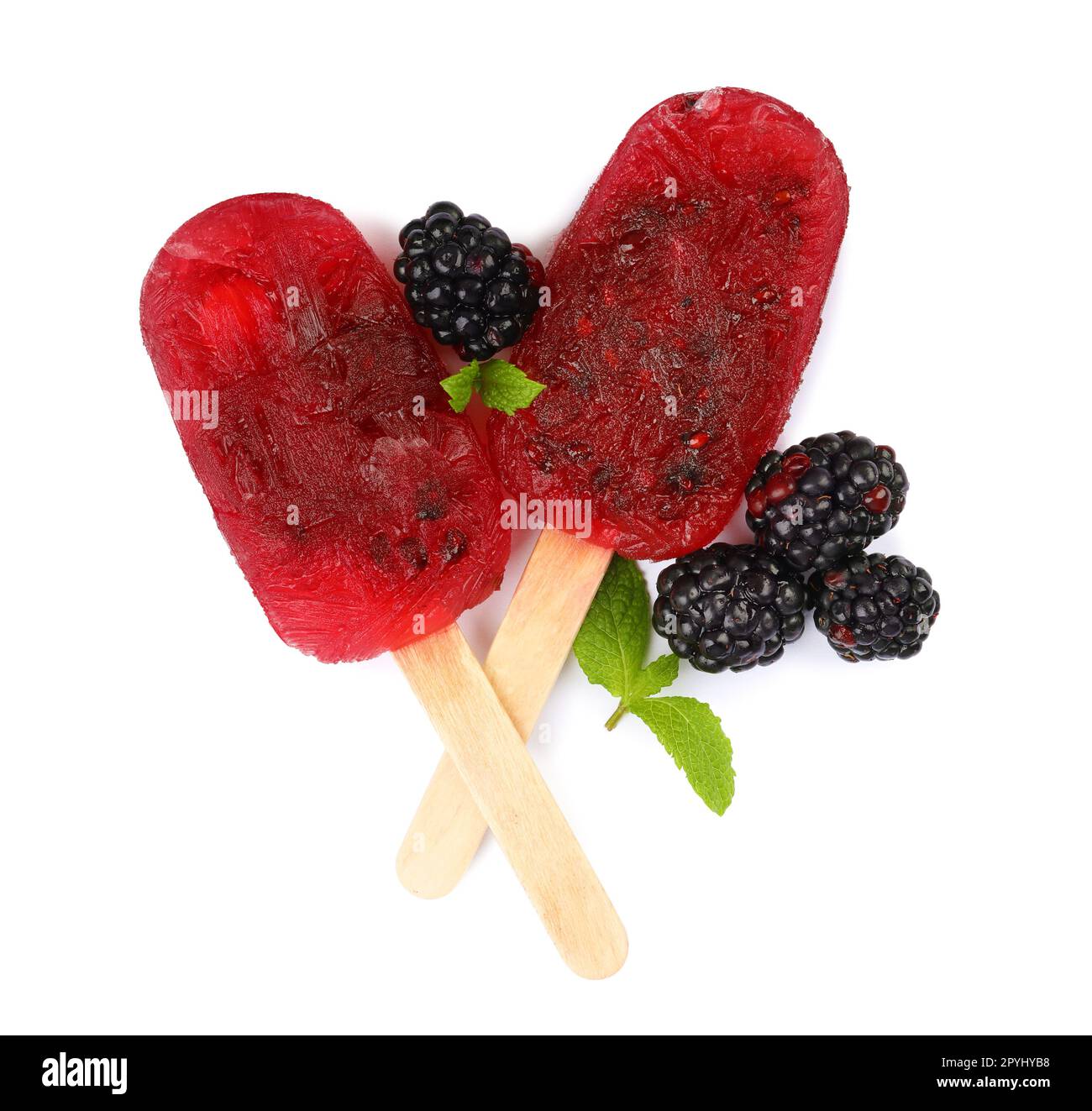 Delicious ice pops and fresh blackberries on white background, top view ...