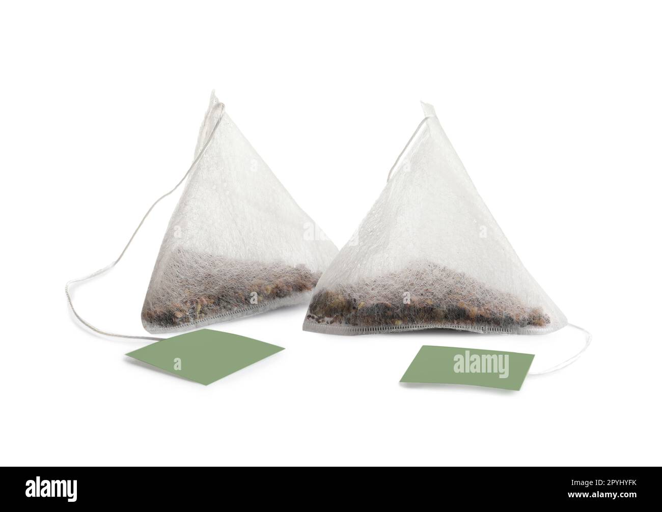 New pyramid tea bags on white background Stock Photo - Alamy