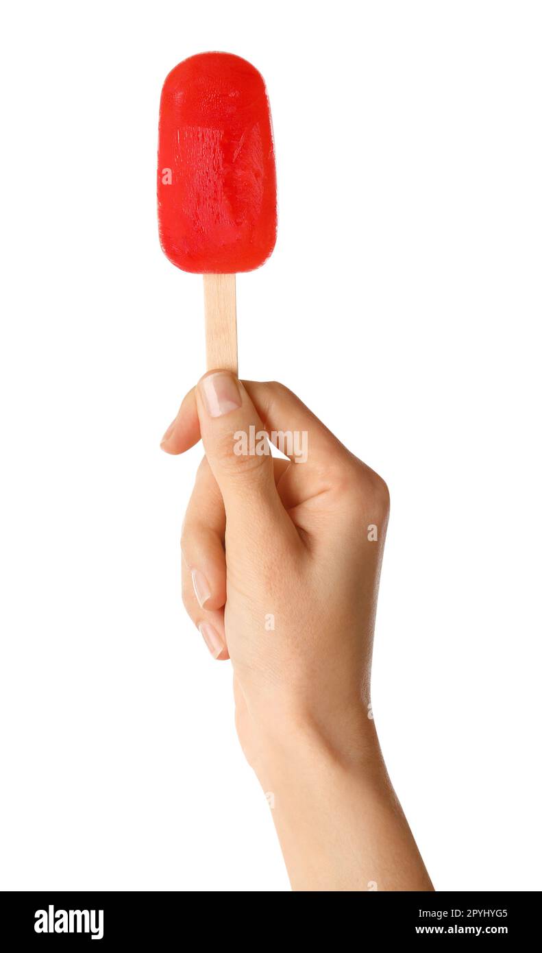 Woman holding tasty fruit ice pop on white background, closeup Stock ...