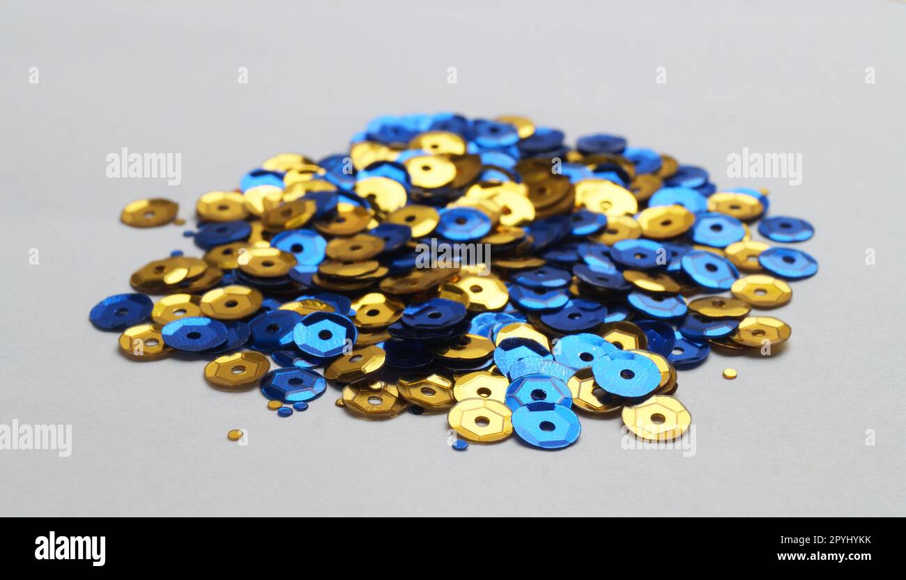 Pile of colorful sequins on light grey background, closeup Stock Photo ...