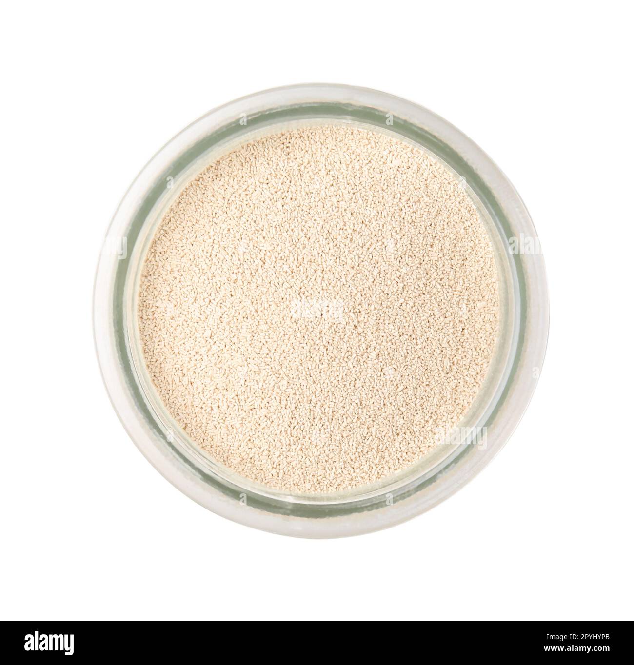Granulated yeast in glass jar isolated on white, top view Stock Photo ...