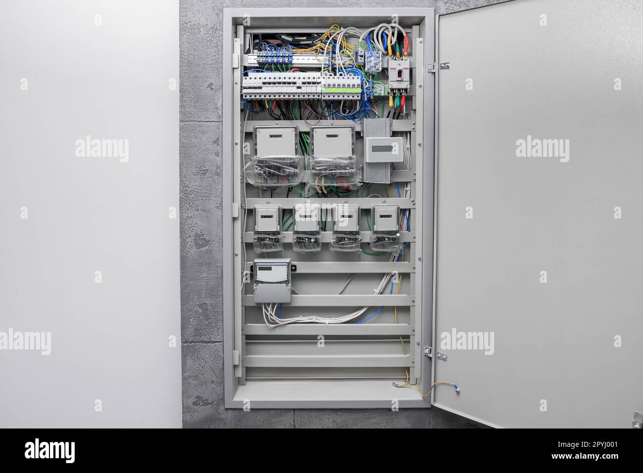 Fuse box with many electric meters and wires Stock Photo - Alamy