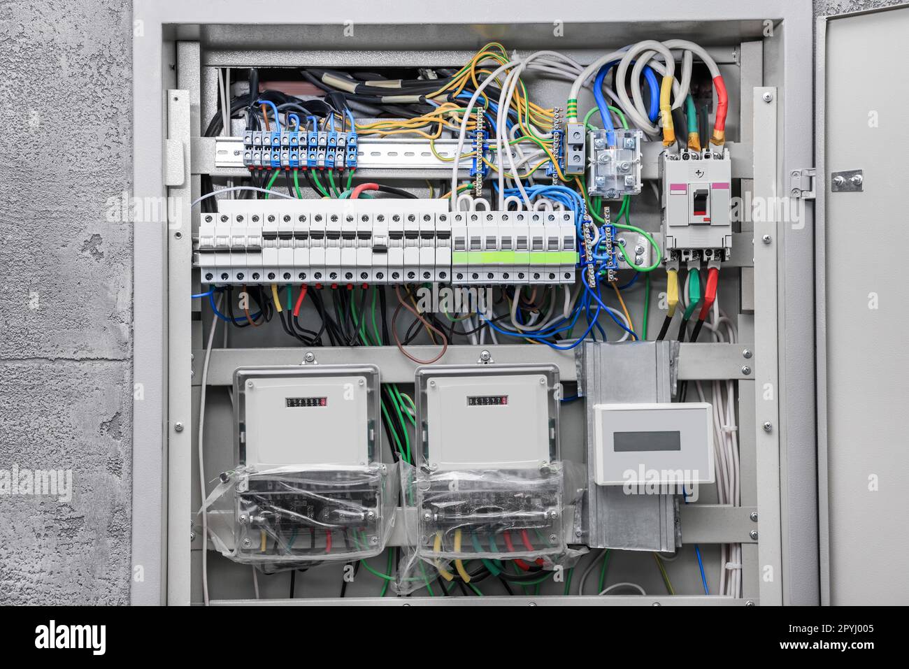Fuse box with many electric meters and wires Stock Photo - Alamy