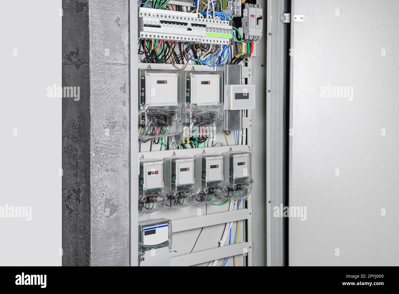 Fuse box with many electric meters and wires Stock Photo - Alamy