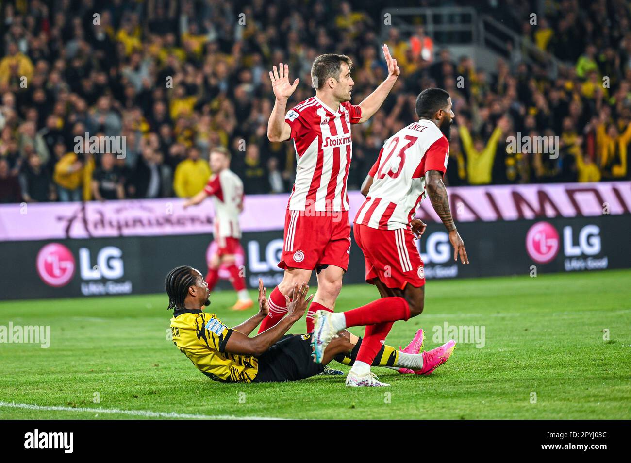 7 LEVI GARCIA of AEK FC competing with 15 SOKRATIS PAPASTATHOPOULOS and ...