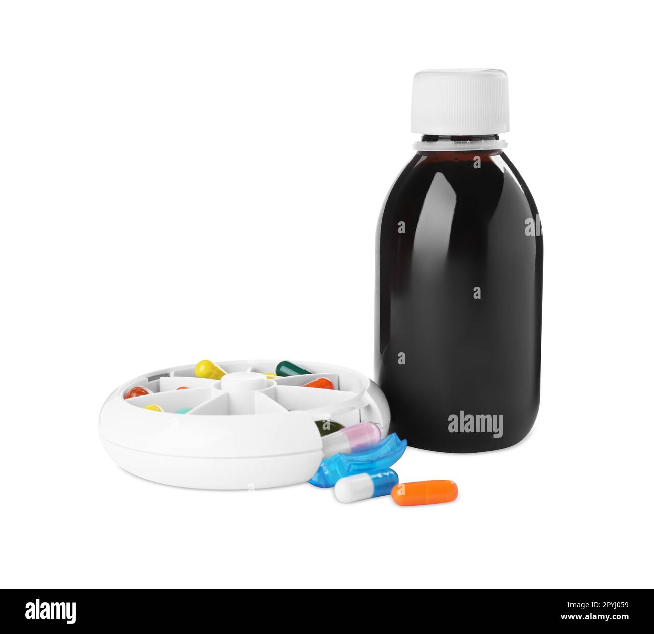 Bottle of syrup with pills on white background. Cough and cold medicine ...