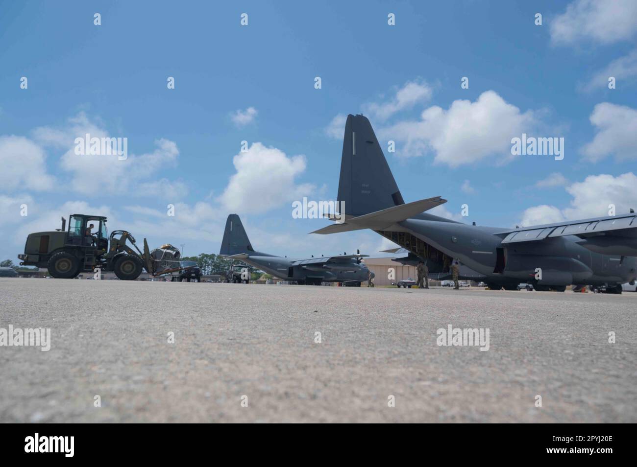 Loadmasters assigned to the 24th Special Operations Wing load a Rigging ...