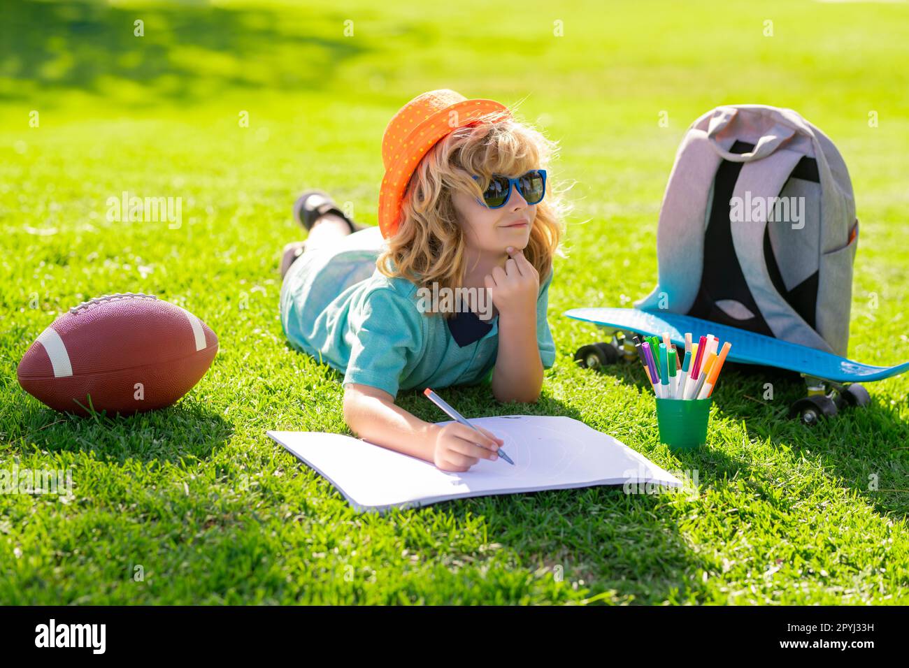 Little painter draw pictures outdoor. Child artist paints creativity ...