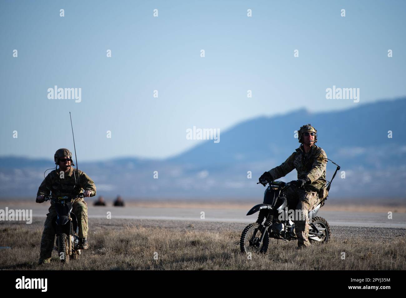 Airmen with the 123rd Special Tactics Squadron monitor Highway 287 as a ...