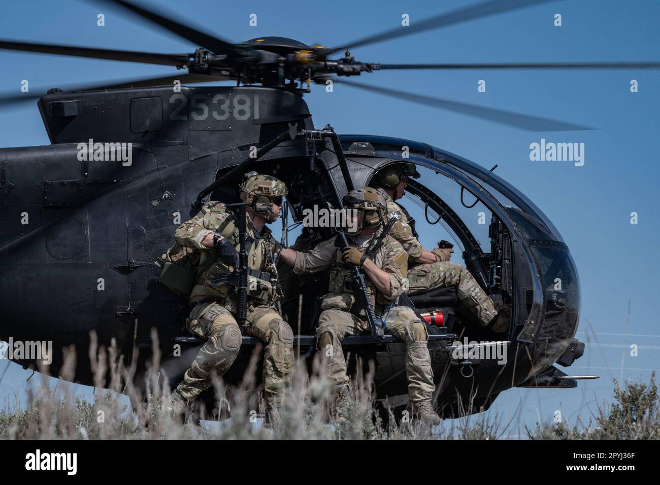 123rd Special Tactics Squadron operators load onto an MH-6 Little Bird ...