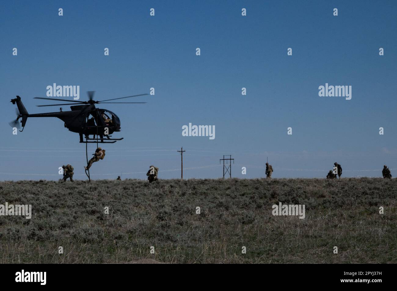 123rd Special Tactics Squadron operators fast rope from an MH-6 Little ...