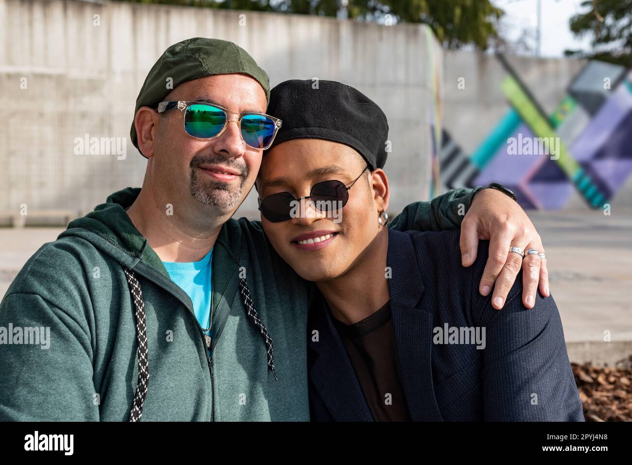Gay friends hugging hi-res stock photography and images - Alamy