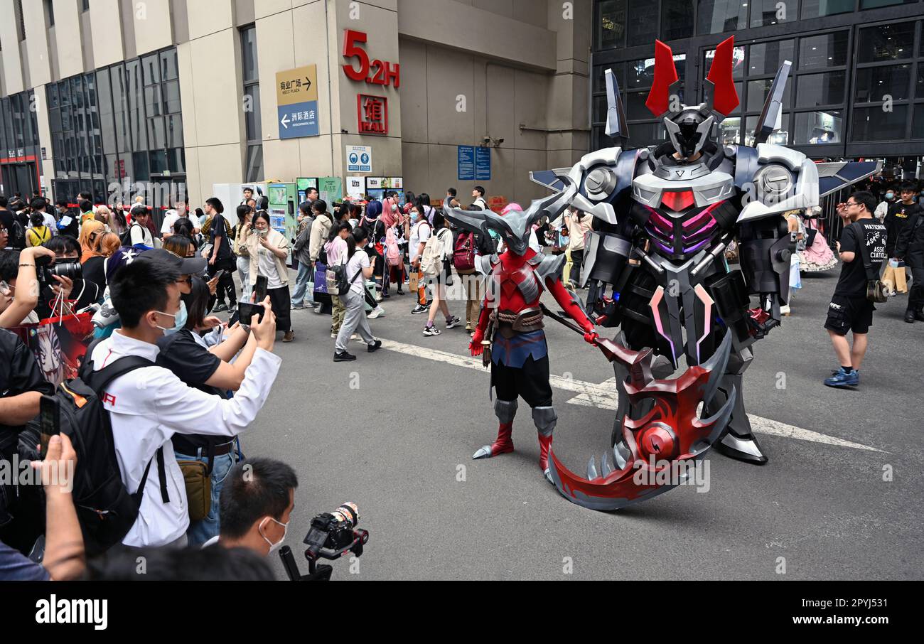 SHANGHAI, CHINA - MAY 3, 2023 - Players display large mecha costumes ...
