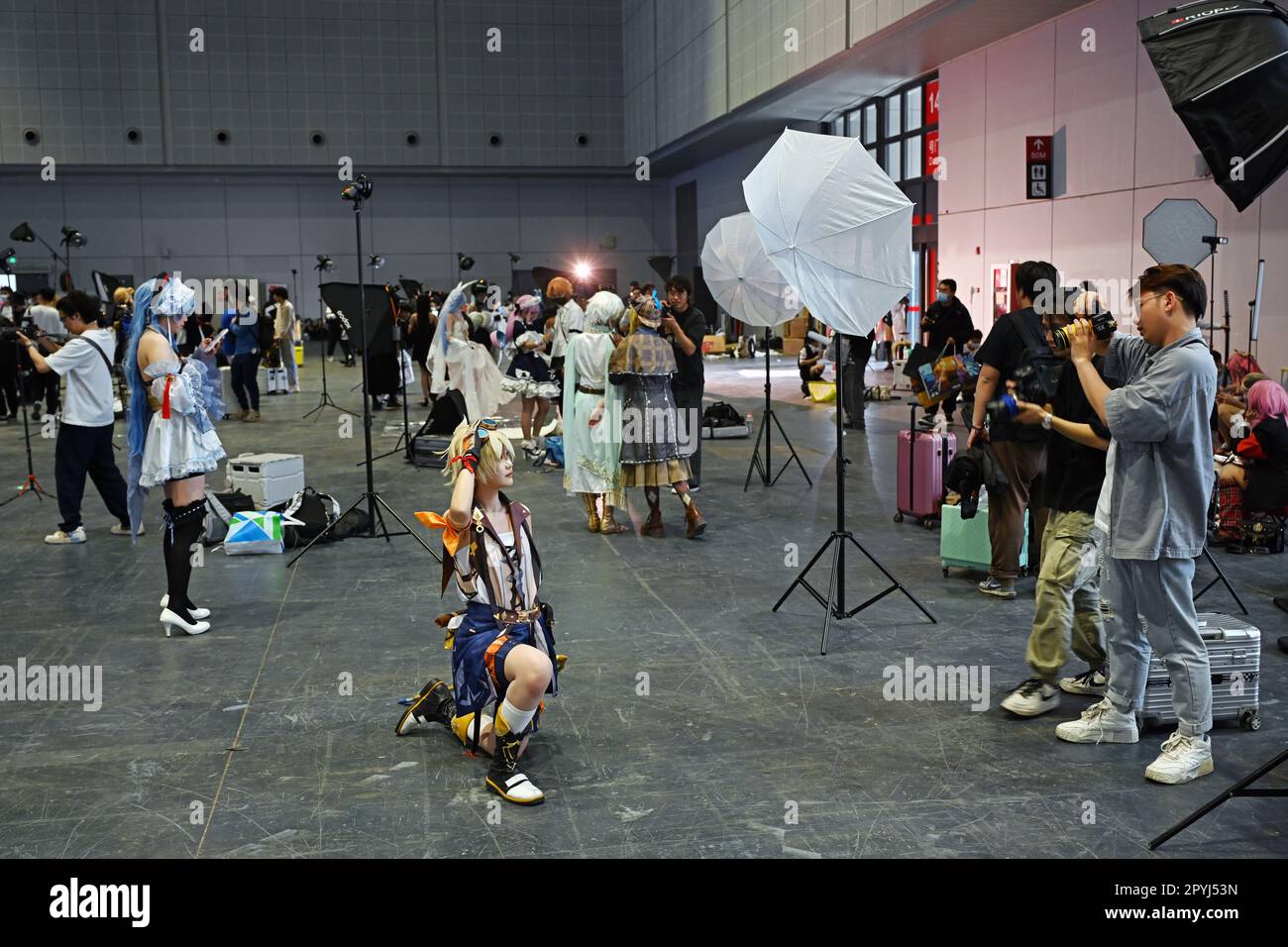 SHANGHAI, CHINA - MAY 3, 2023 - Cosplayers and photographers pose in ...