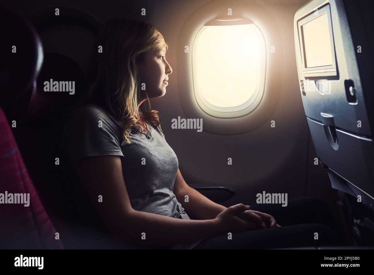 The view from here is spectacular. an attractive young woman looking ...