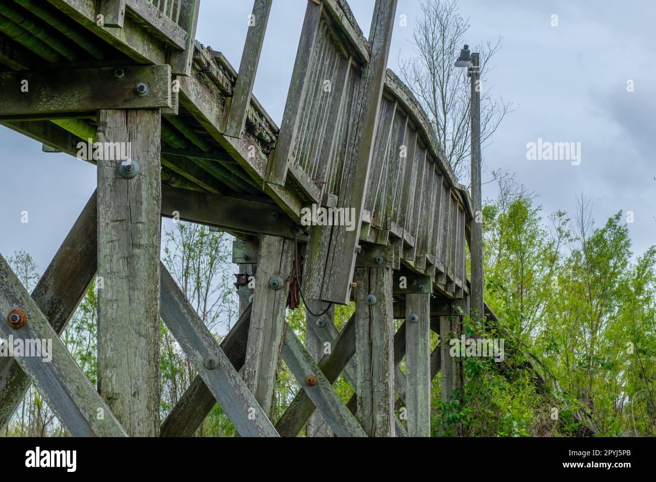 Worn and broken wooden foot bridge near the Mississippi River in Kenner ...