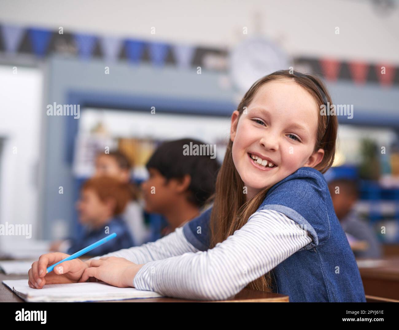 Its her favourite lesson. elementary school children in class Stock ...