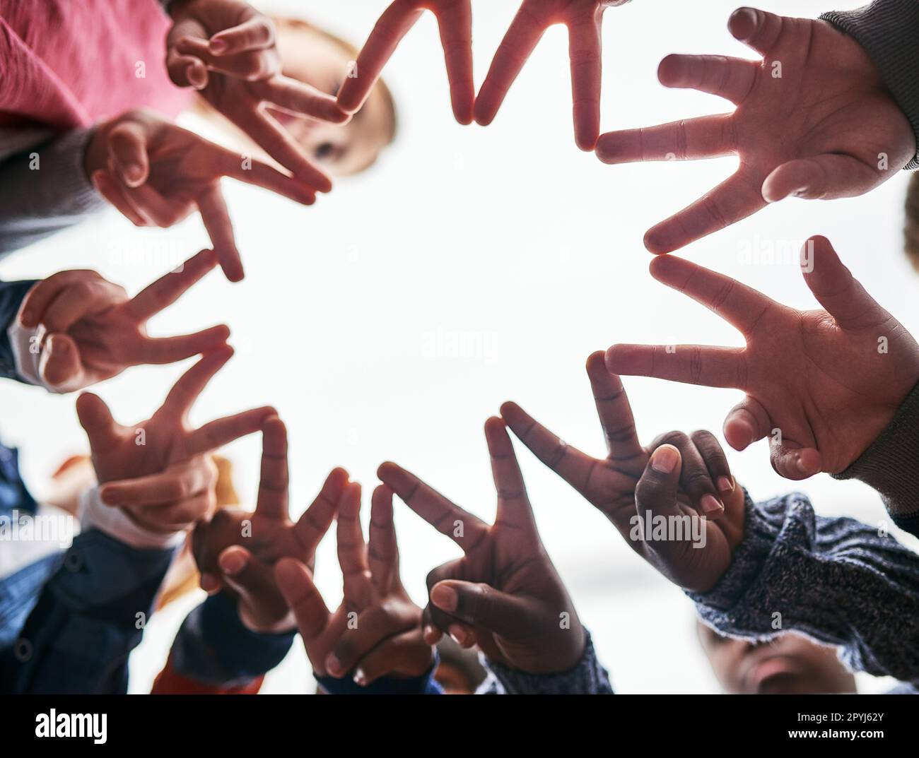 Creating shapes with our fingers. elementary school children in class ...