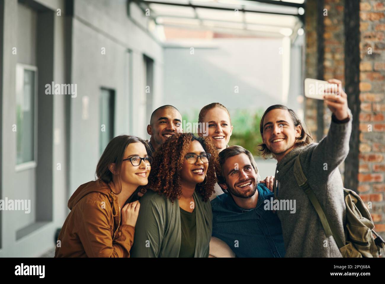 First selfie of the semester. Portrait of a group of happy young ...