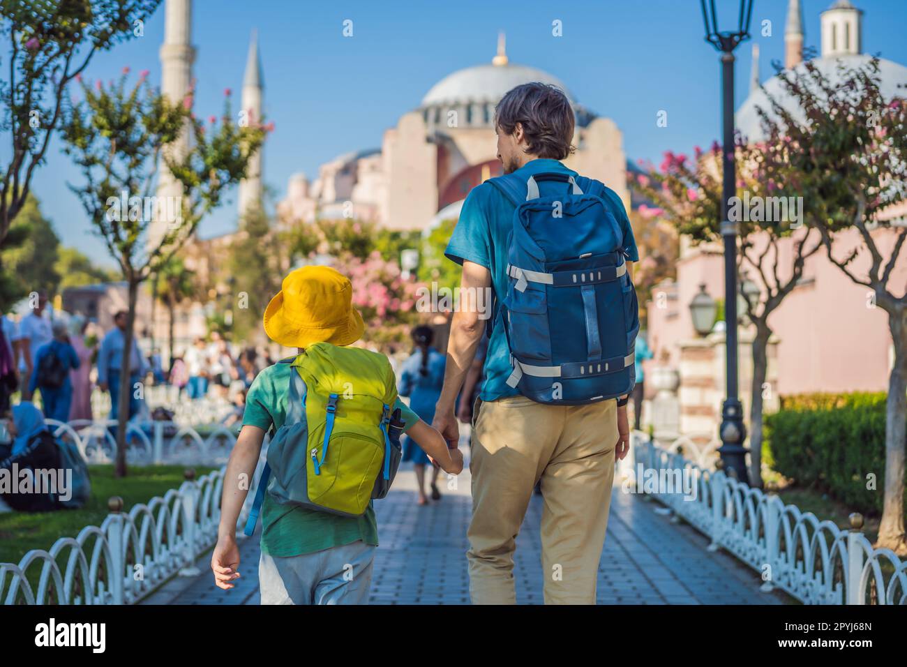 Father and son Tourists enjoy beautiful view on Hagia Sophia Cathedral ...