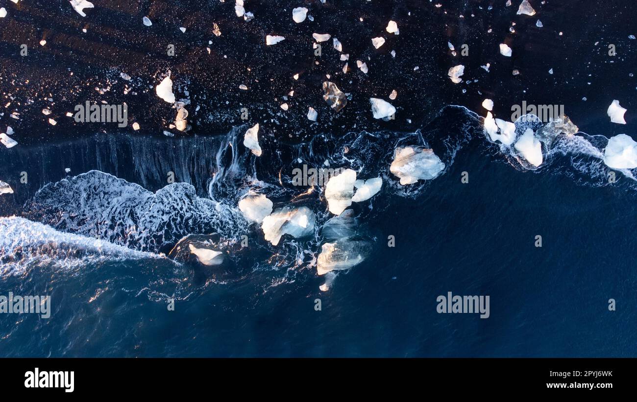 Melting Arctic Ice in Ocean Water, Blue Glacier Ice with Snow on Black ...