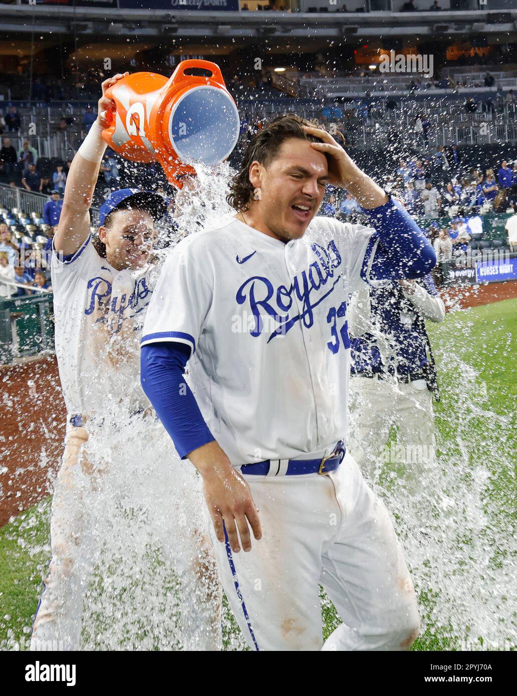 Kansas City Royals' Nick Pratto (32) gets doused by Bobby Witt Jr ...