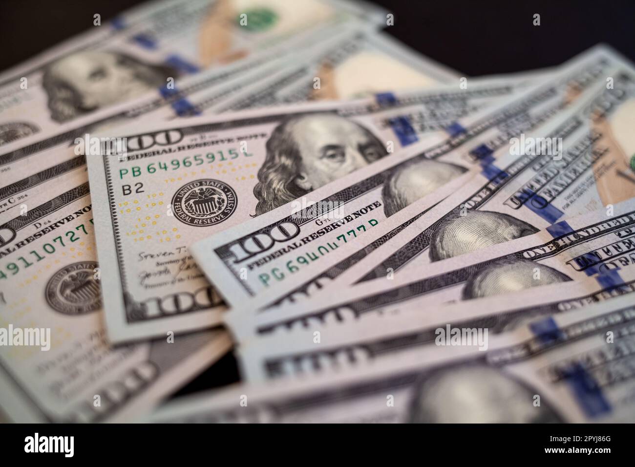 pile of one hundred US banknotes. Background with money american ...